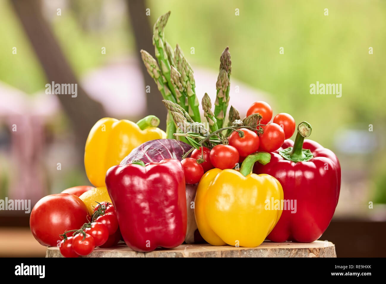 Natural foods. Red and yellow bell pepper, tomatoes, onion and ...