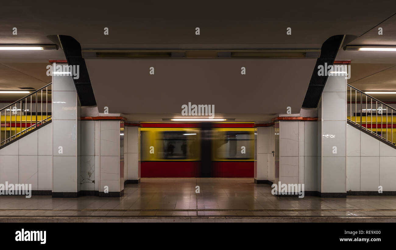 The train arrives at the underground railway Stock Photo - Alamy