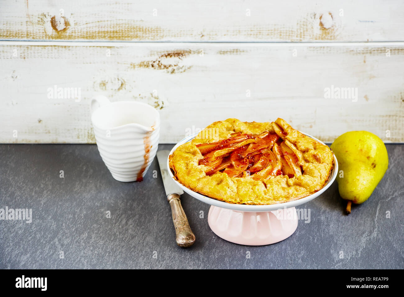 Pear pie or tart with raspberry jam. Seasonal Fall or Autumn dessert ...