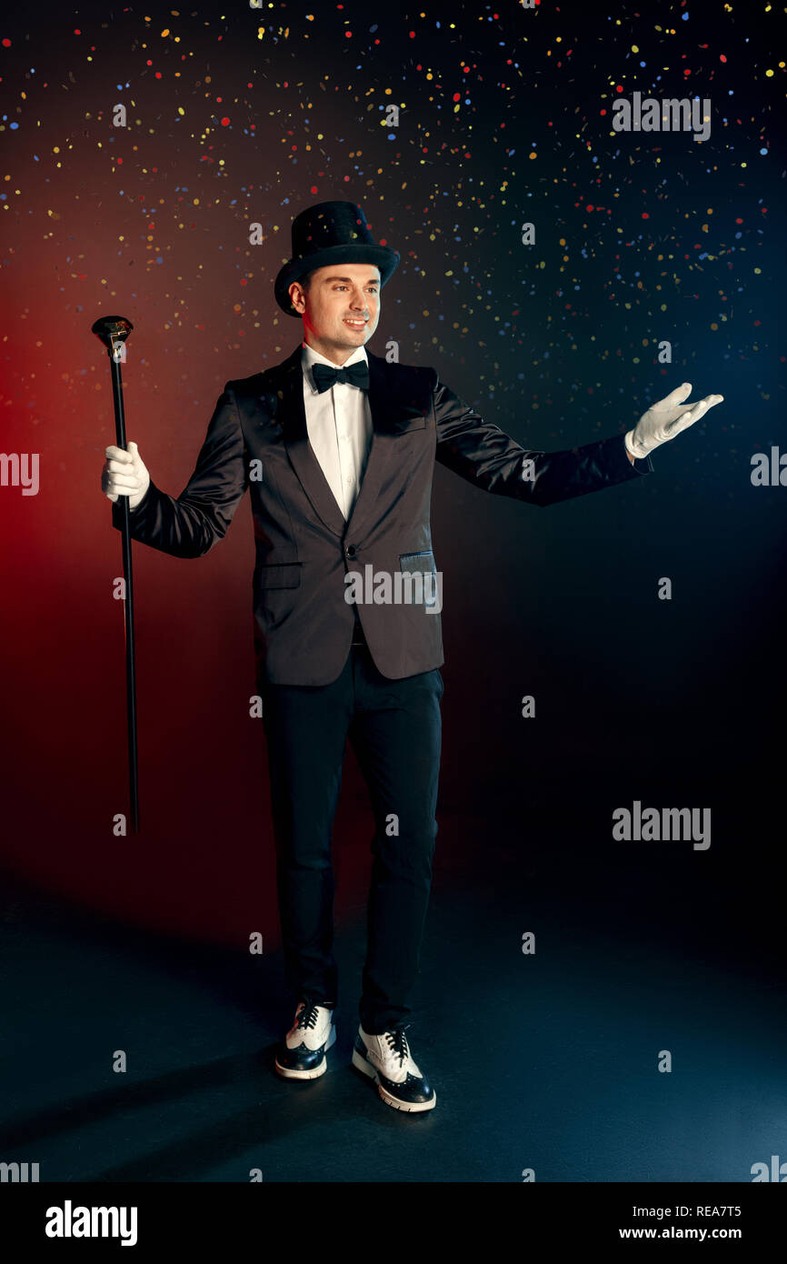 Professional Occupation. Showman in suit gloves and hat standing ...
