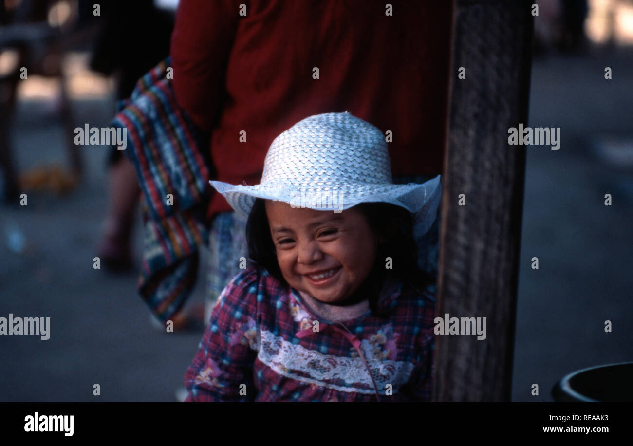 A young, indigenous Kiche Maya girl at the marketplace in Momostenango ...