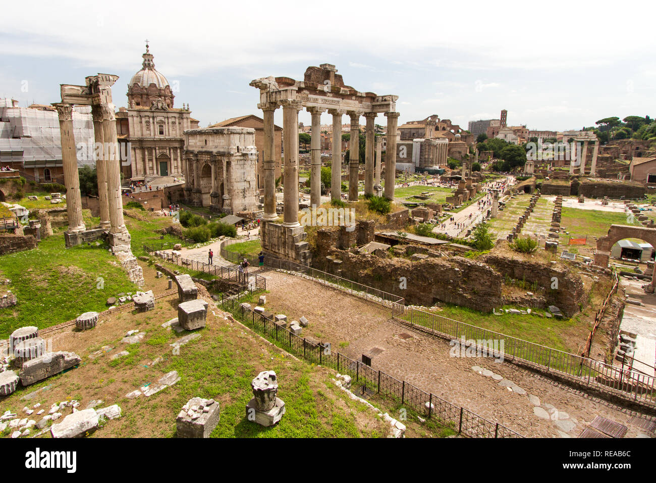 Heart of Ancient Rome - Visitors tour the ancient Roman Forum, center ...