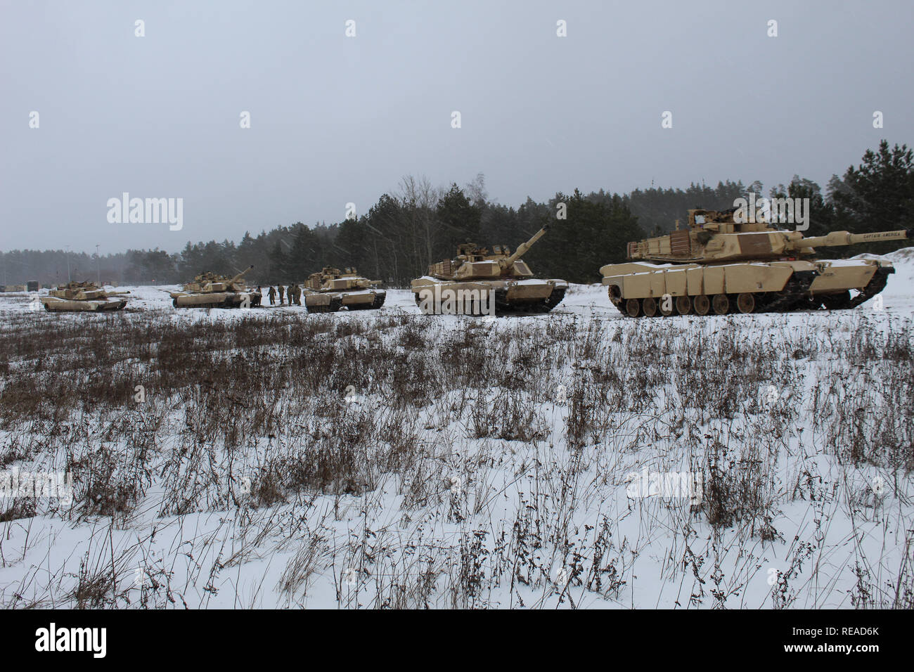 Battle Group Poland preforms winter live fire training during Operation ...