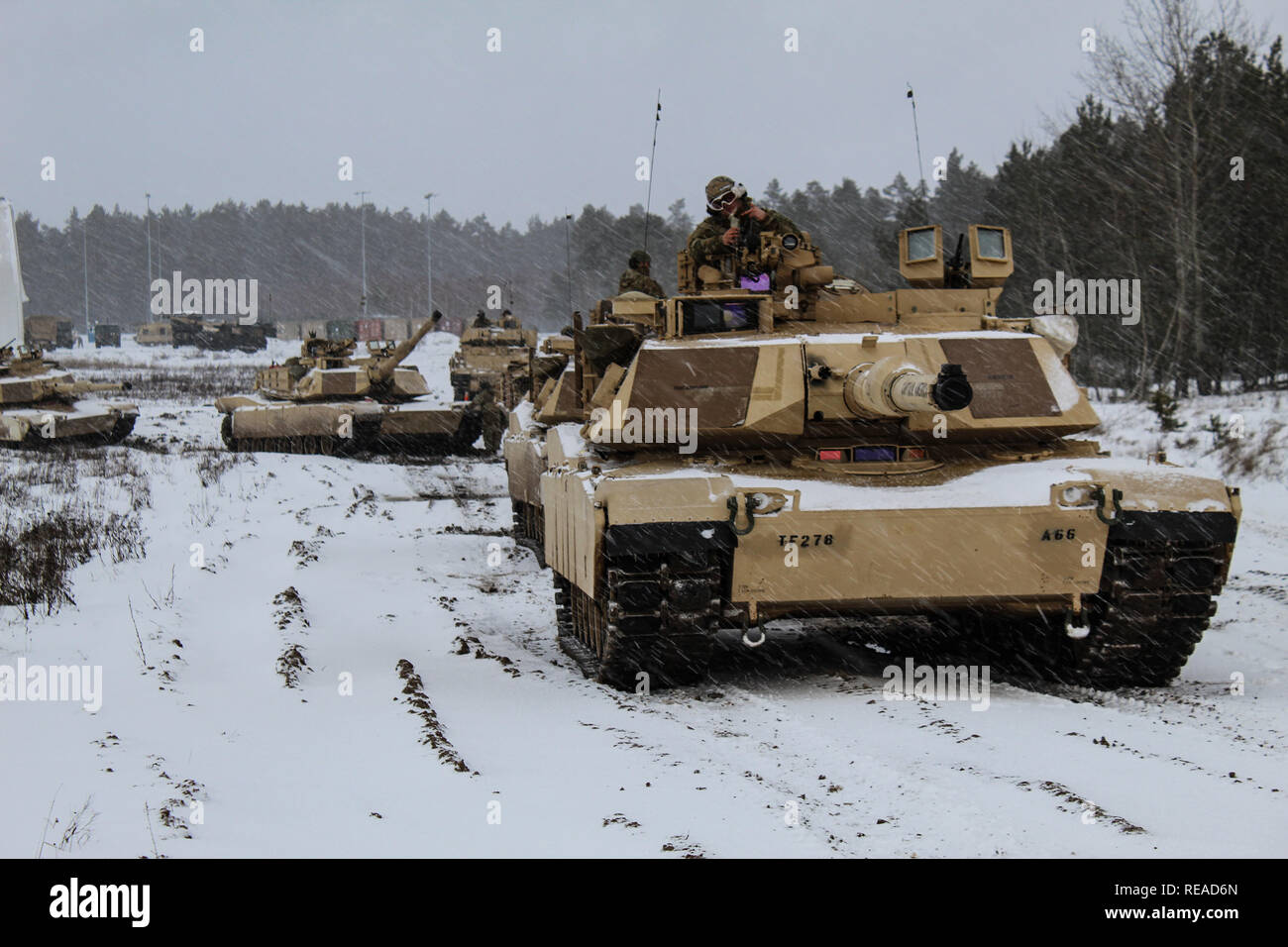 Battle Group Poland preforms winter live fire training during Operation ...
