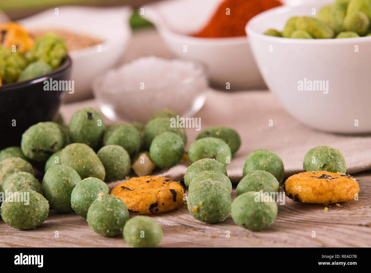 Wasabi coated peanuts Stock Photo - Alamy