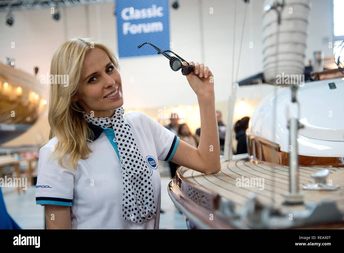 Boat model Jana in front of a historic wooden sailboat in the Classic ...