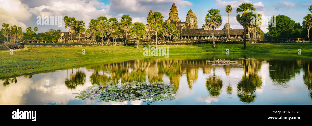 Angkor Wat temple reflecting in water of Lotus pond at sunset. Siem ...