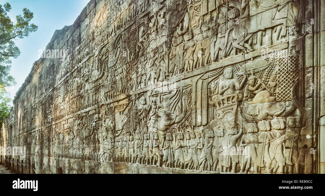 Bas-relief at Bayon temple in Angkor Thom at morning time. Siem Reap ...