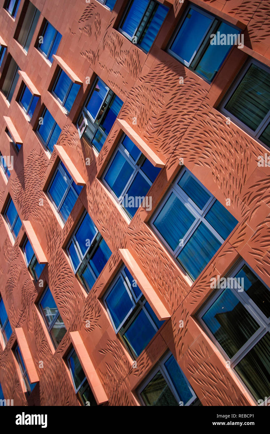 Building Facade - A leaf wave design decorates the exterior of a ...