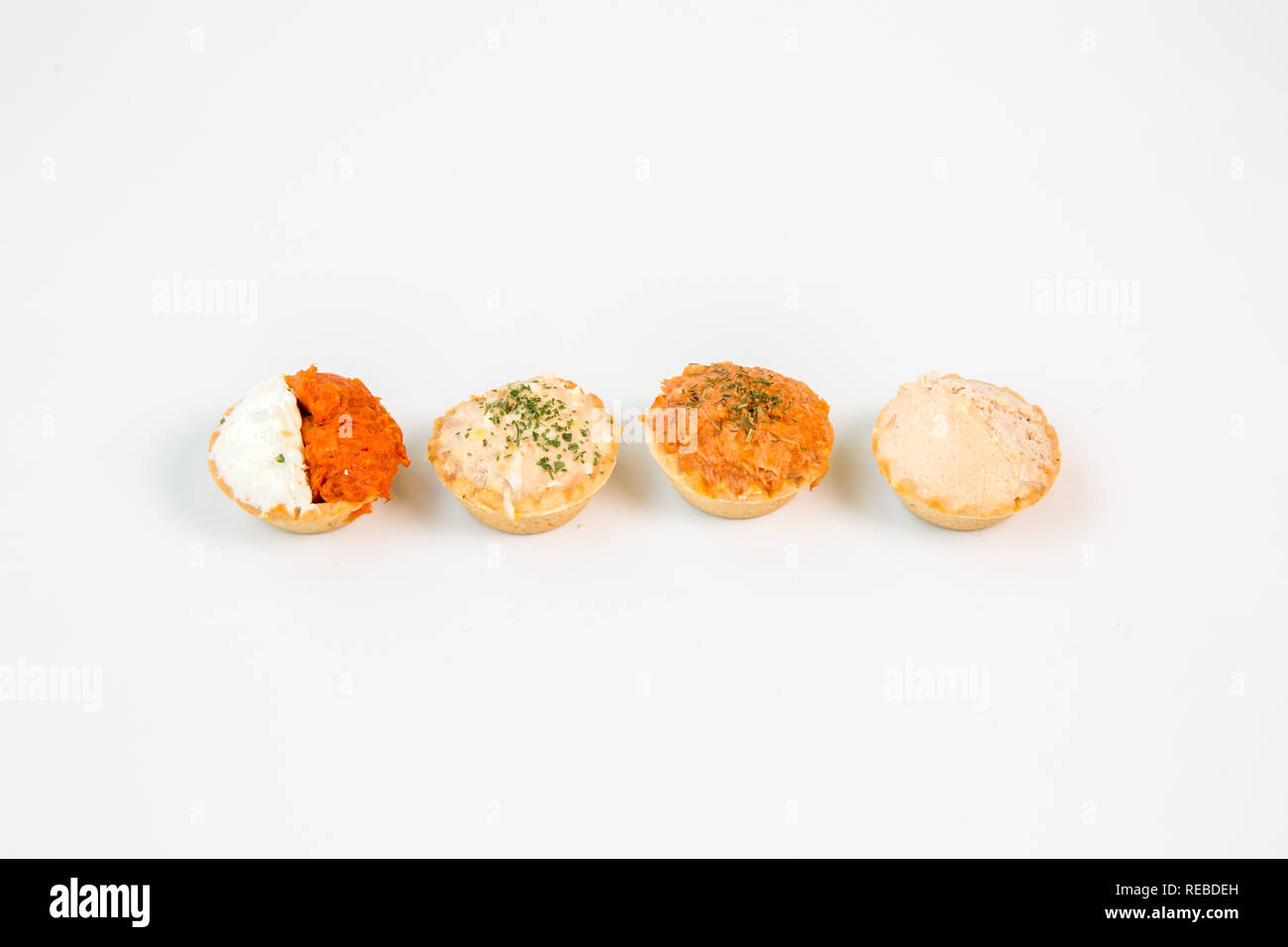 small tasty snacks on white background Stock Photo - Alamy