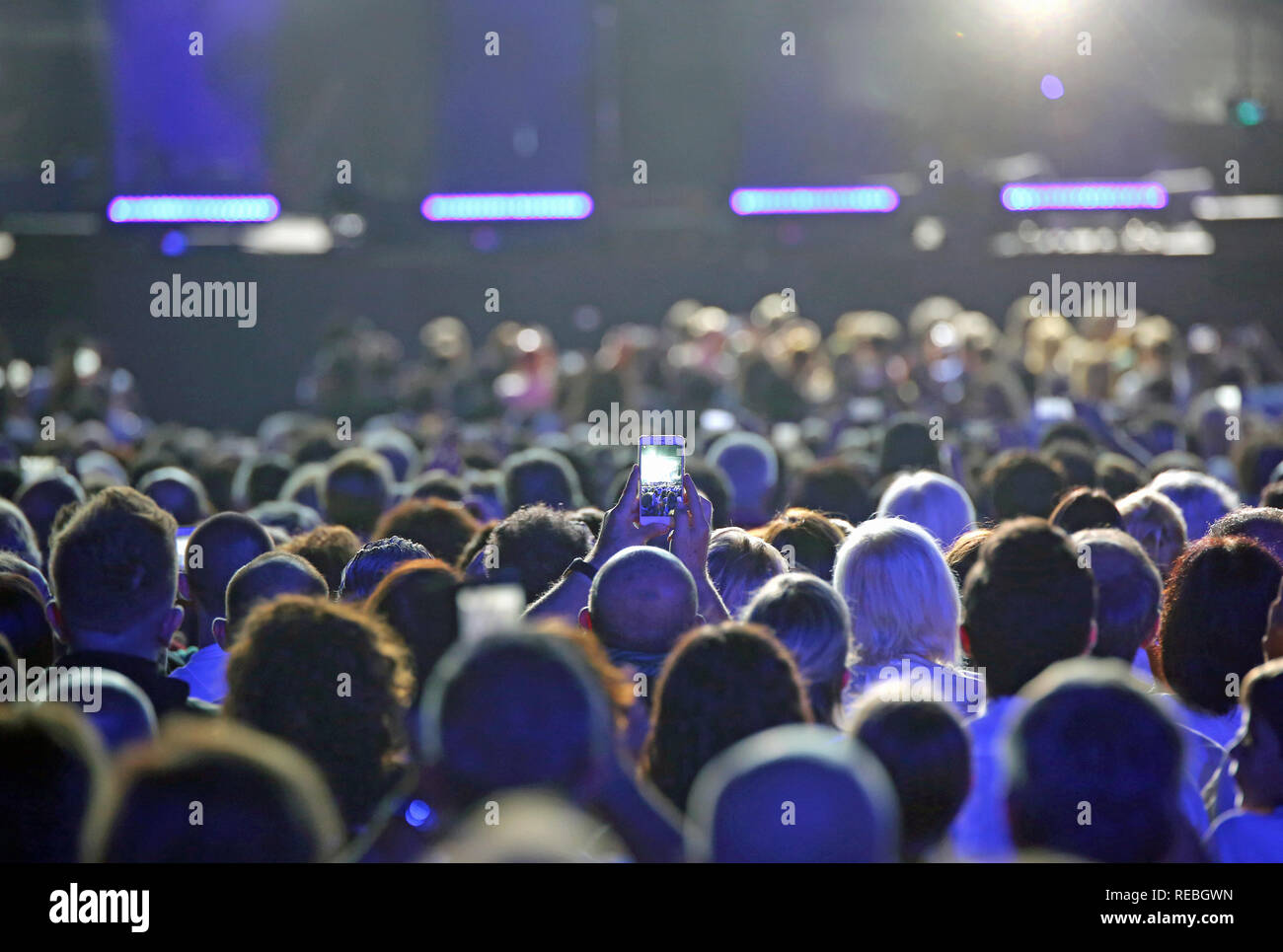 people at live concert with mobile phone take pictures Stock Photo - Alamy