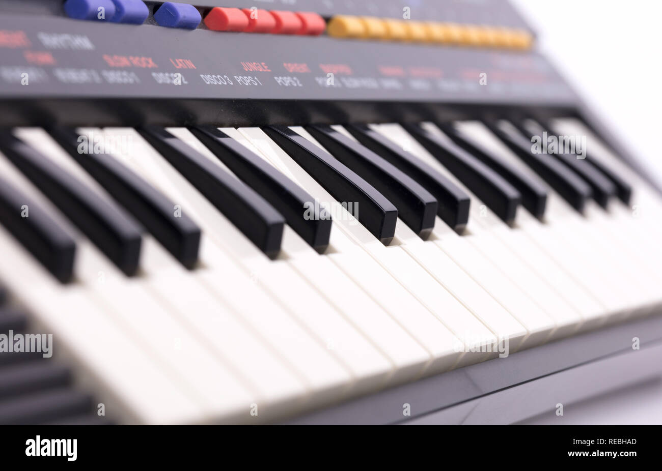Small old keyboard, isolated on a white background Stock Photo - Alamy