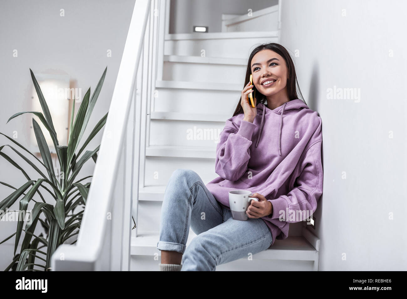Beautiful woman receiving call hi-res stock photography and images - Alamy