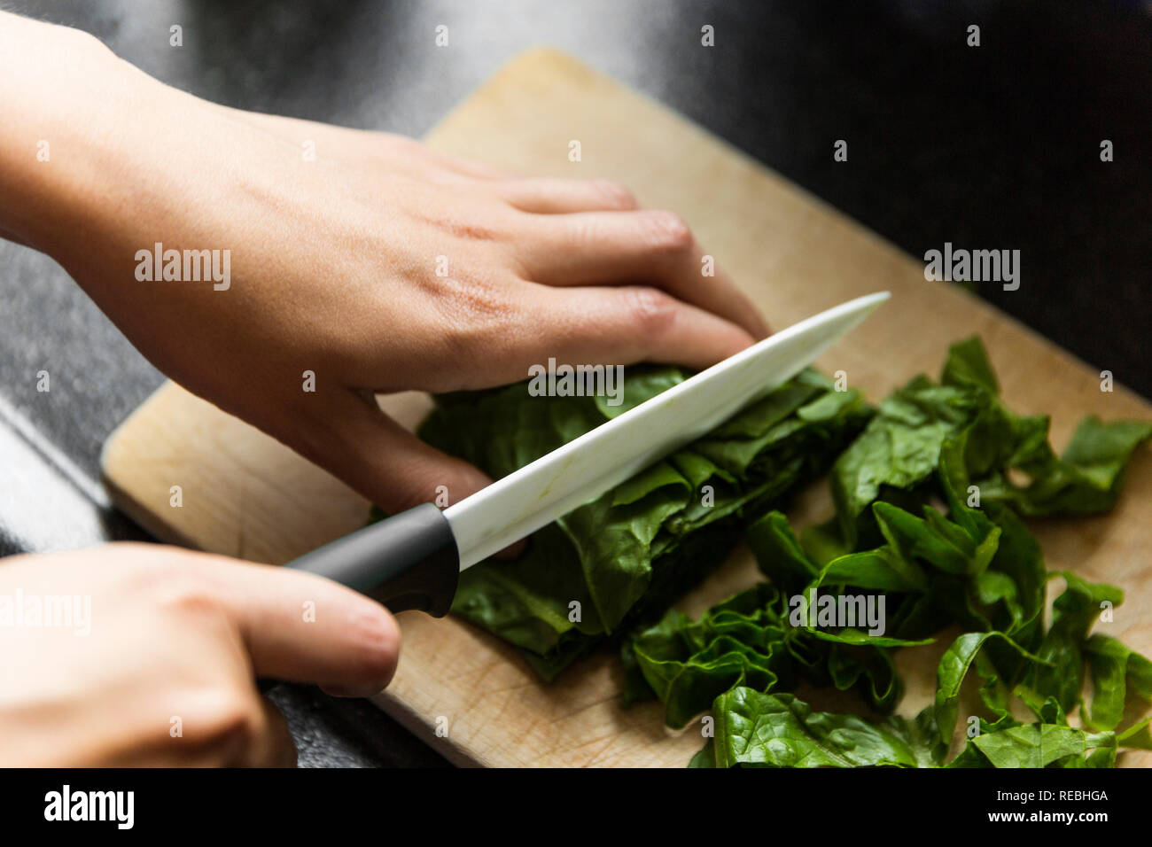 Cutting lettuce leaves hi-res stock photography and images - Alamy
