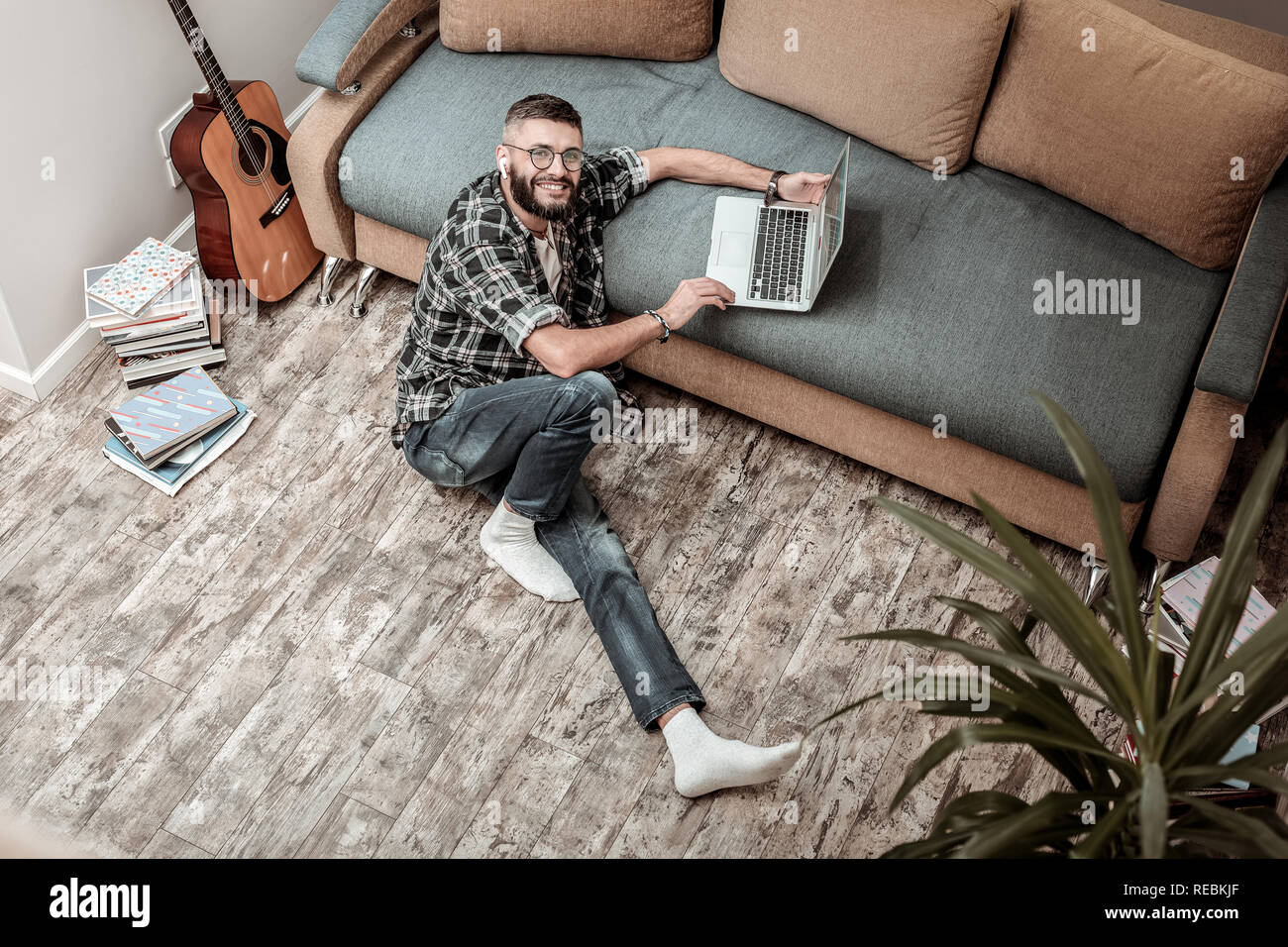 Top view of a cheerful nice young man Stock Photo - Alamy