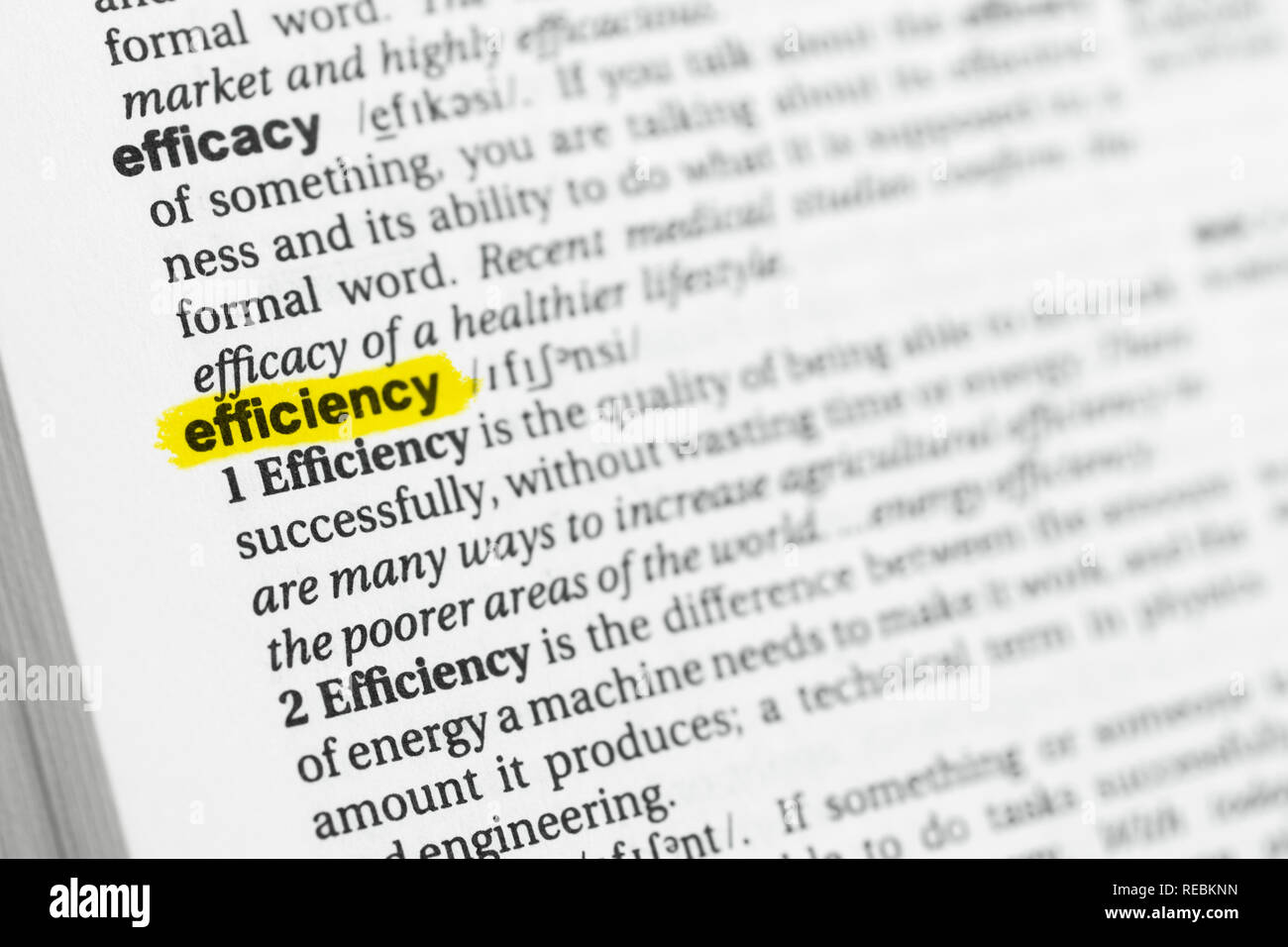 Highlighted English word "efficiency" and its definition at the dictionary Stock Photo - Alamy