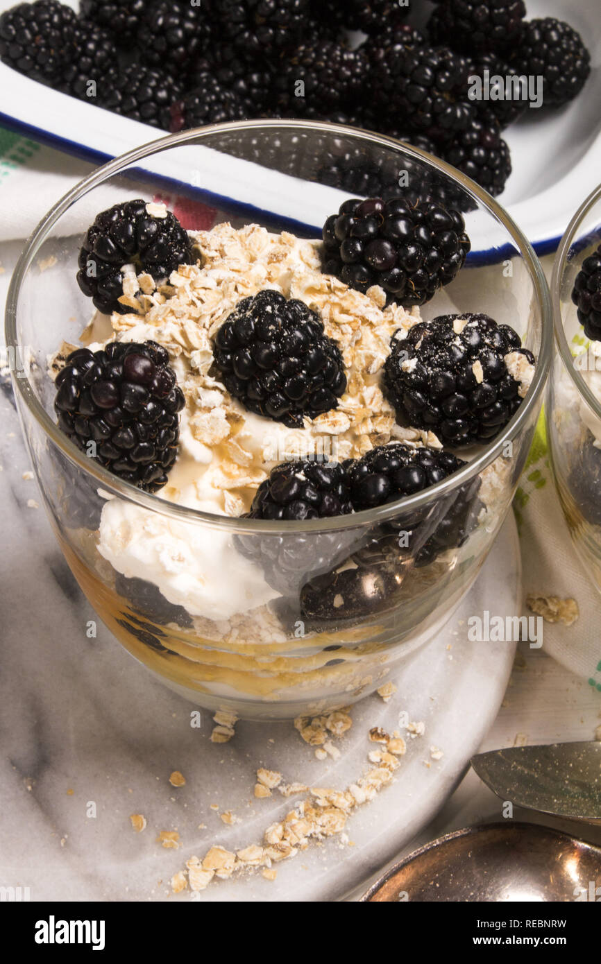 cranachan, a very scottish dessert made with oat flakes, blackberries ...