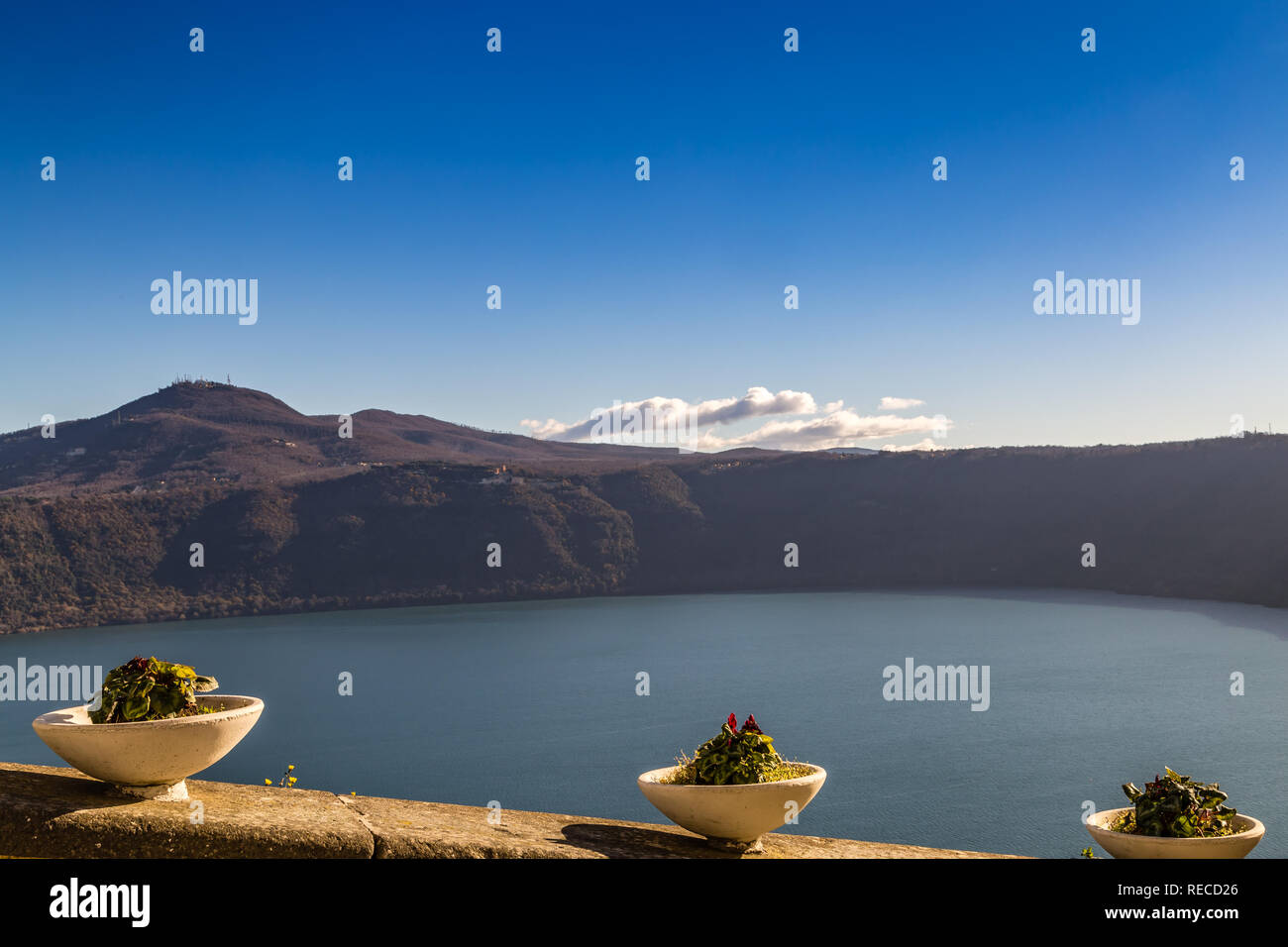 pot of flowers on view of blue waters of Italian lake Stock Photo - Alamy