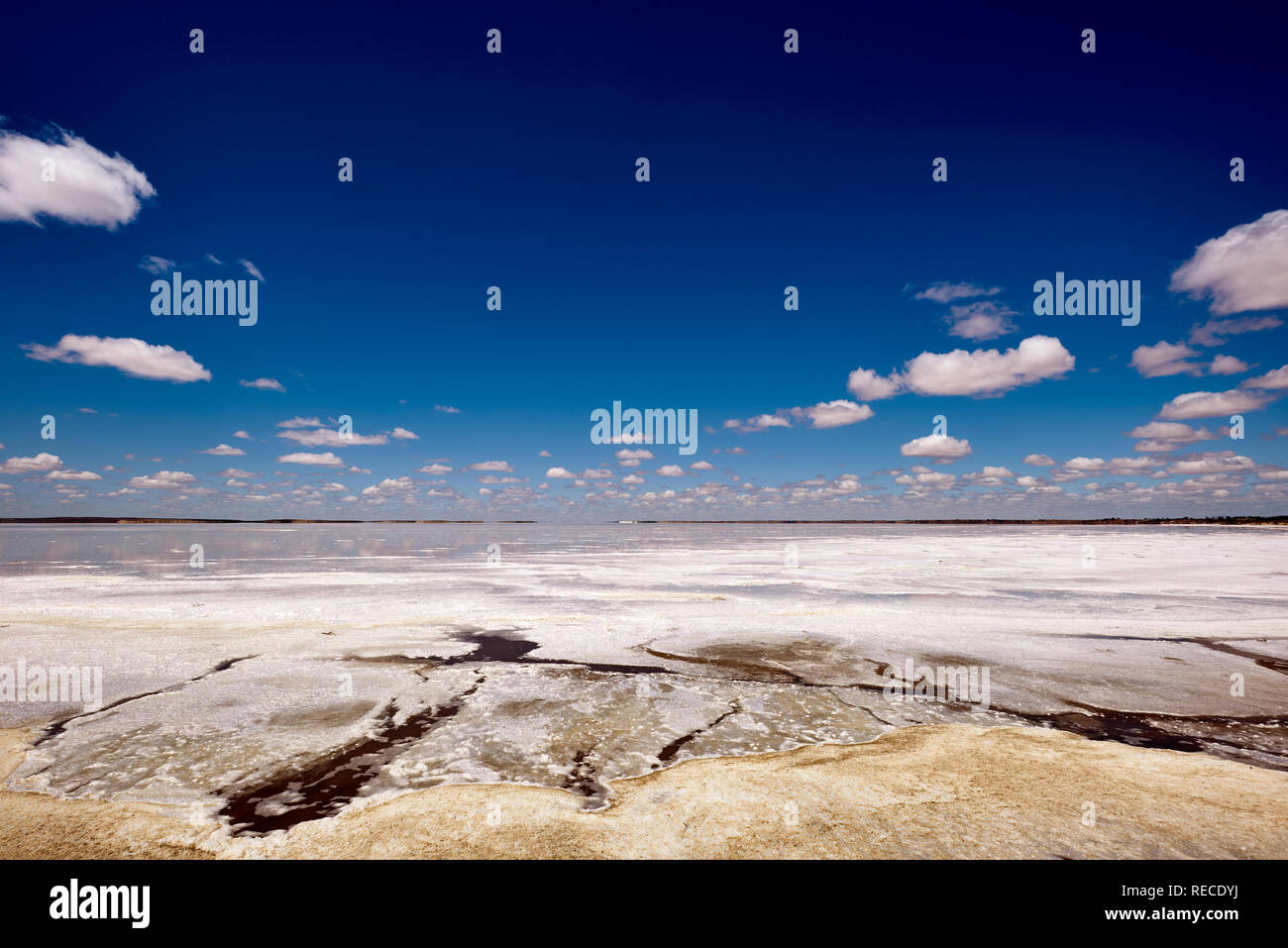 Wide open flat landscape of a large saline lake in north west Victoria ...