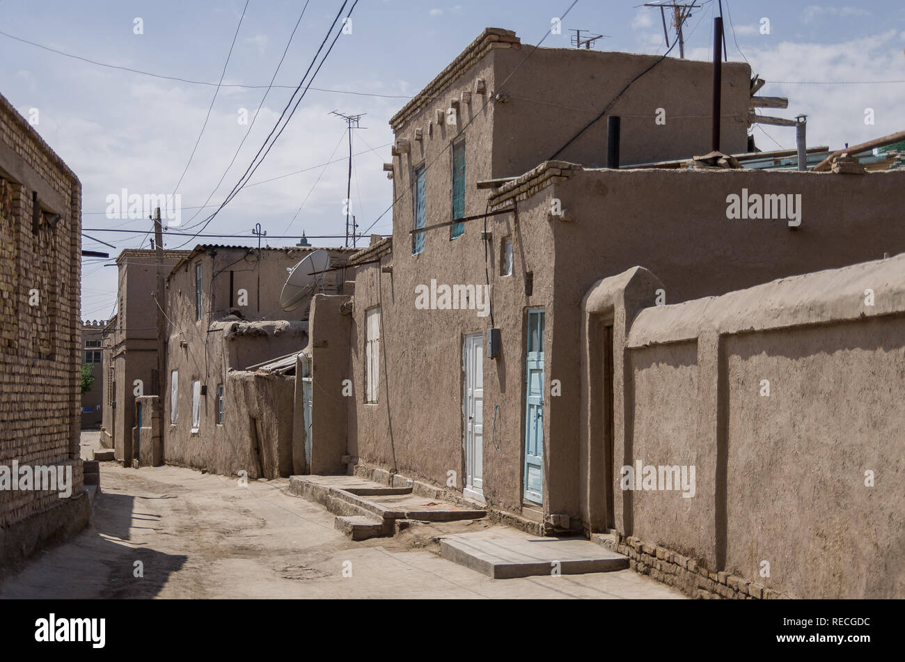 Narrow street of Itchan Kala medieval residential neighborhoods, Khiva ...