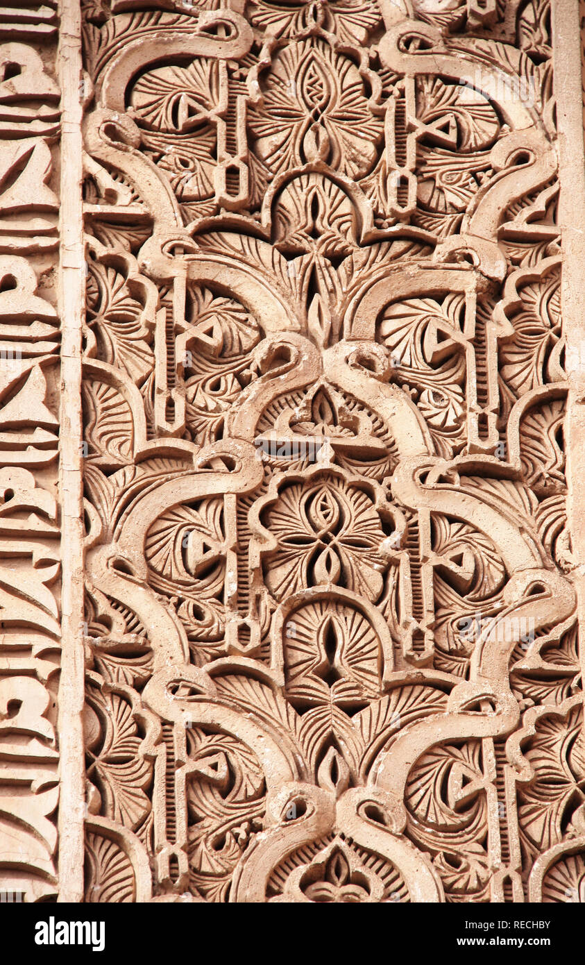 Detail of an ancient ornamental carved stone ornament in the Moroccan ...