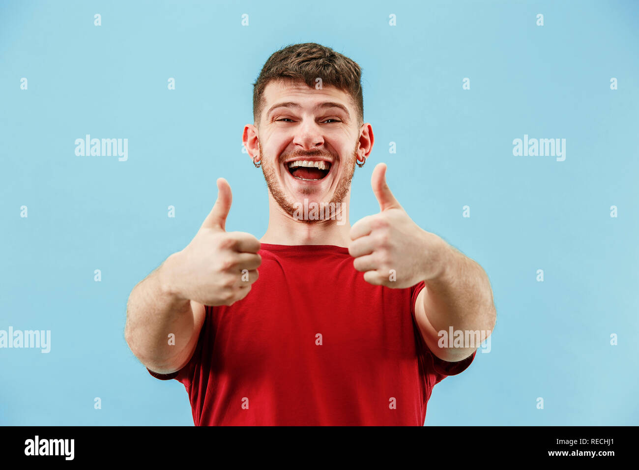 I am ok. Happy businessman, sign ok, smiling, isolated on trendy blue ...