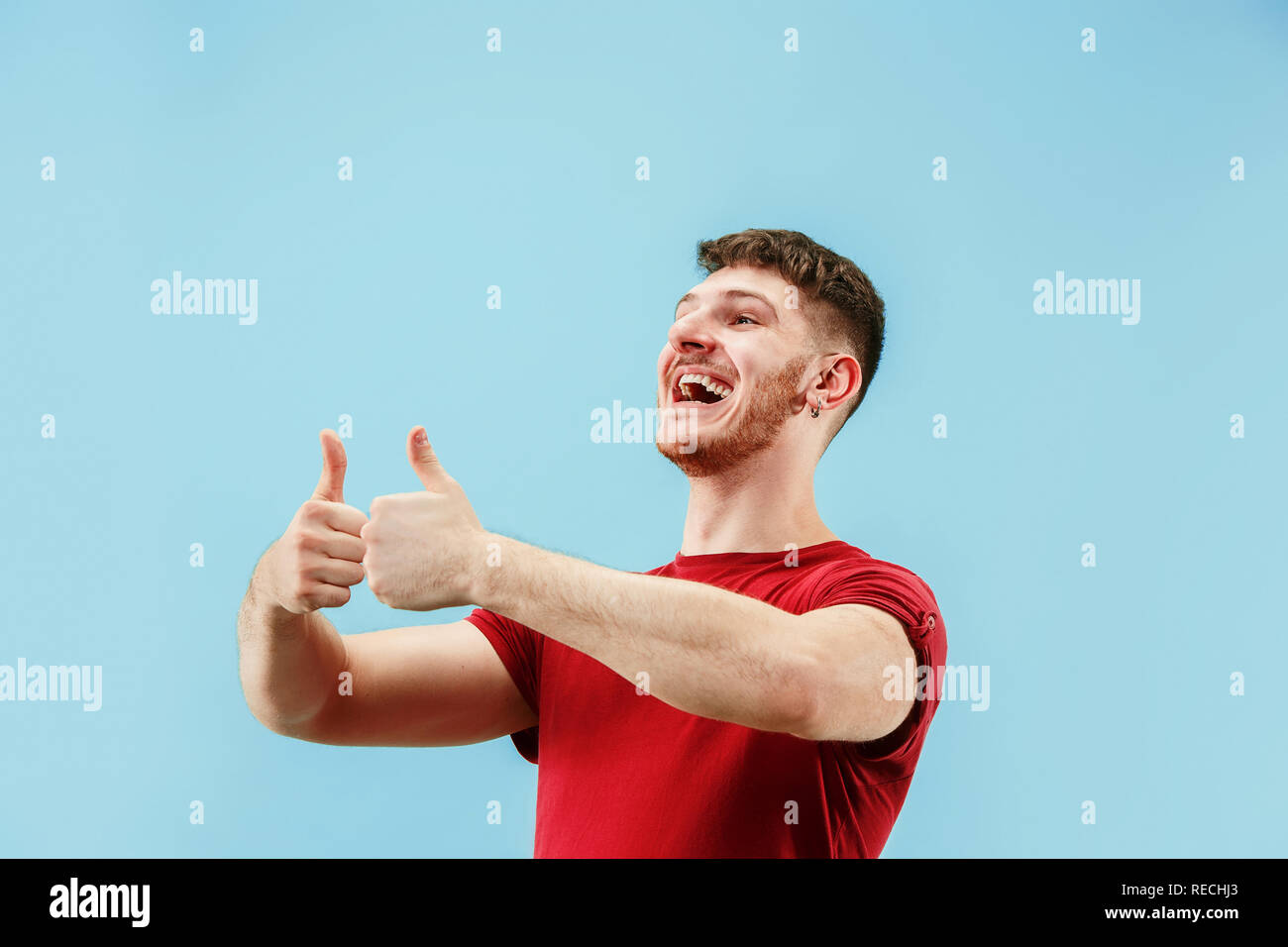 I am ok. Happy businessman, sign ok, smiling, isolated on trendy blue ...