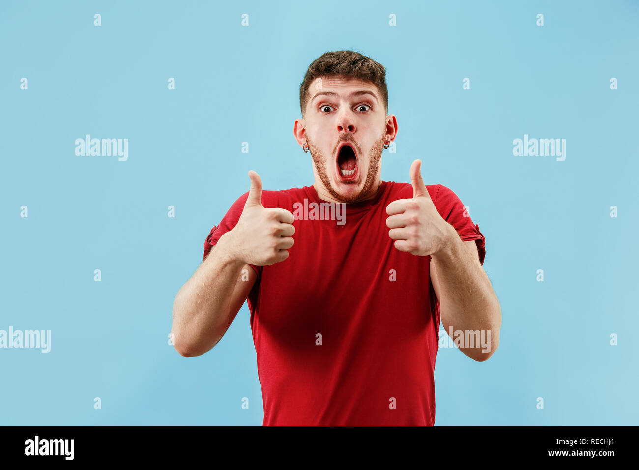 I am ok. Happy businessman, sign ok, smiling, isolated on trendy blue ...