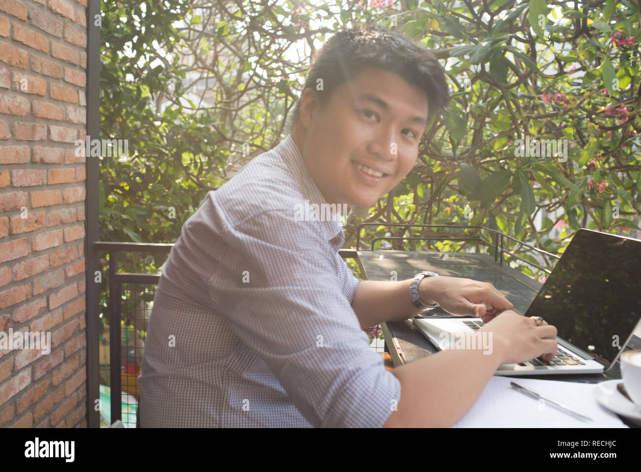 Happy asian freelance businessman hi-res stock photography and images ...