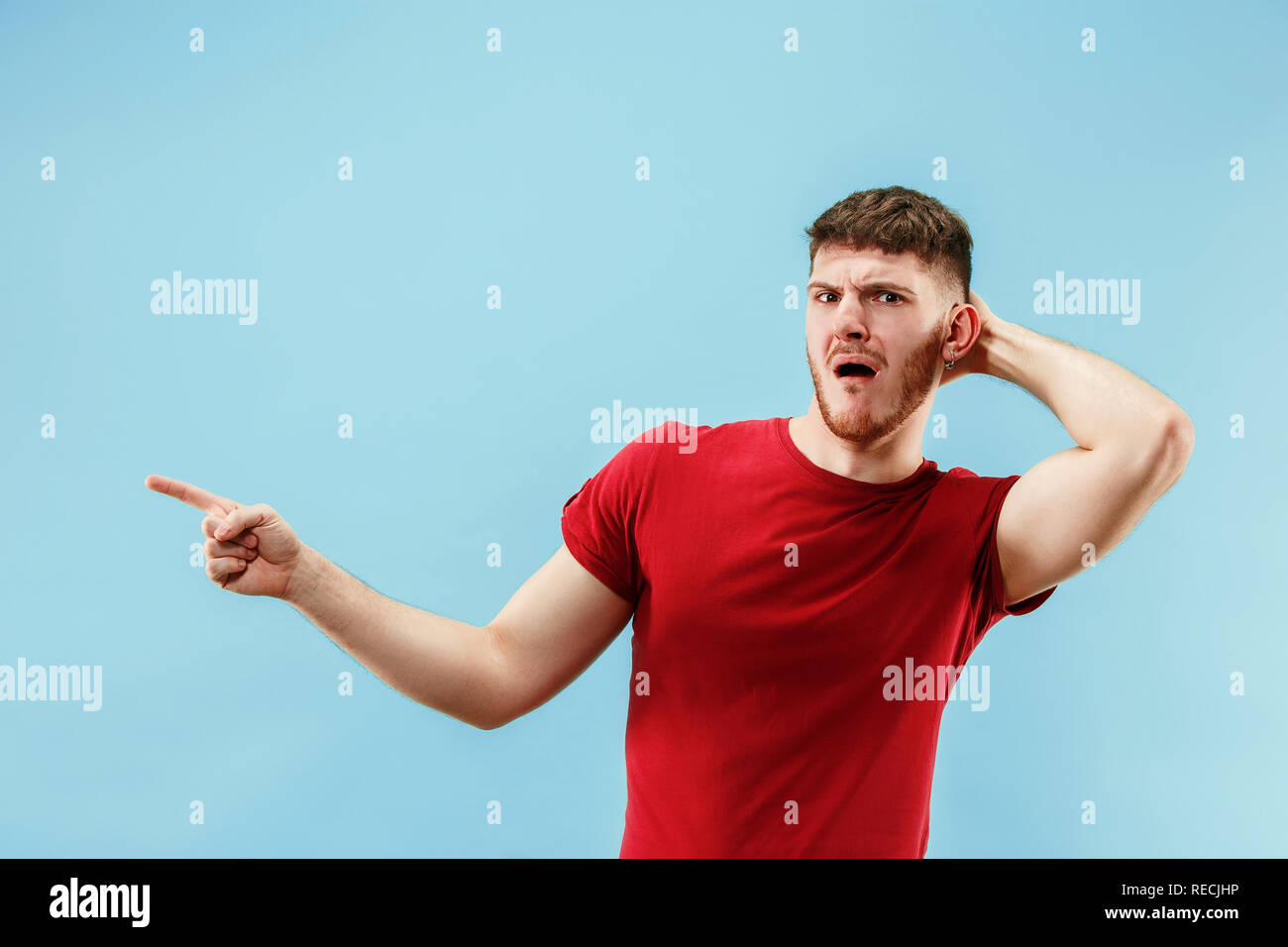 Ew. It's so gross. Young man with disgusted expression repulsing ...