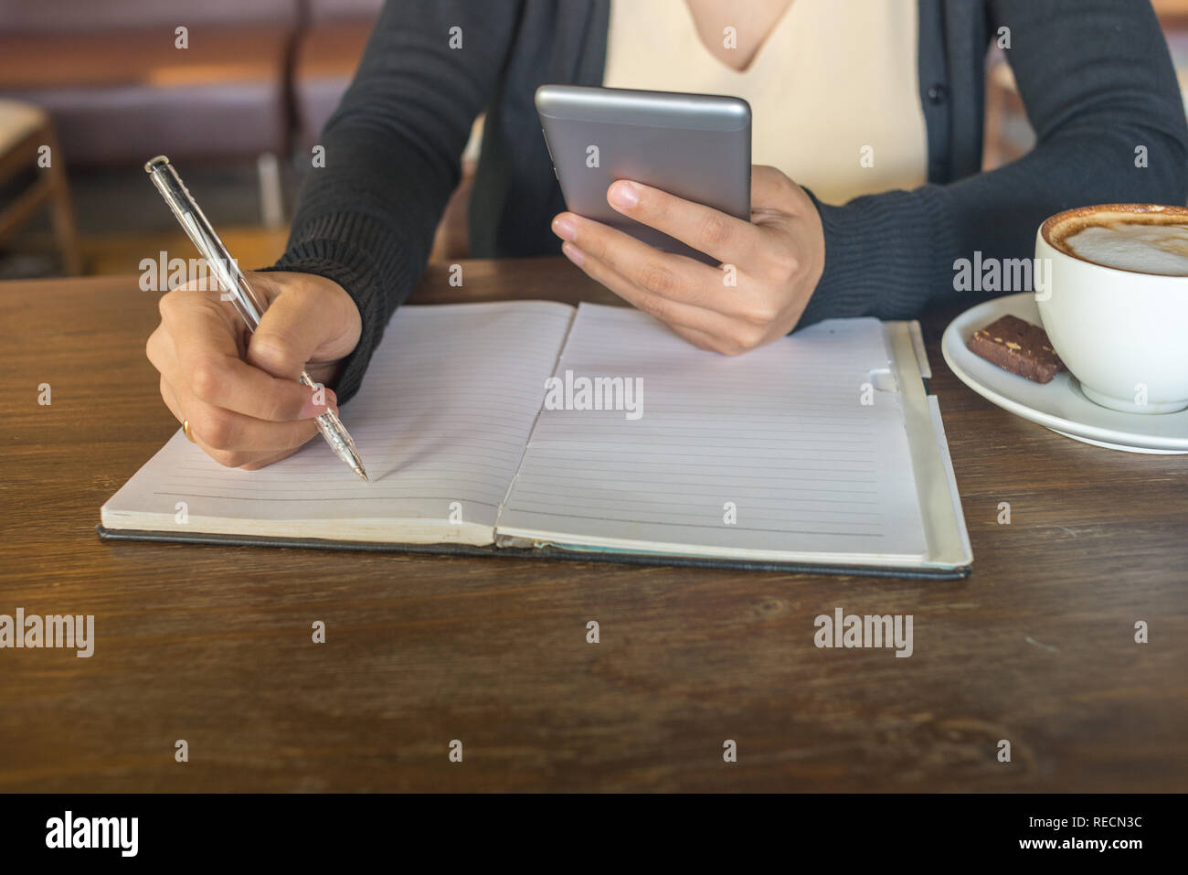 Beautiful woman take notes writing hi-res stock photography and images ...