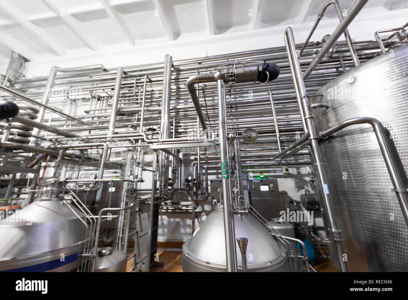 Cheese-making equipment of cheese factory background Stock Photo - Alamy