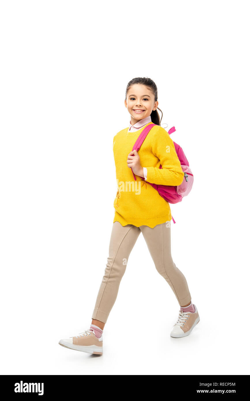 adorable child walking and smiling at camera isolated on white Stock ...