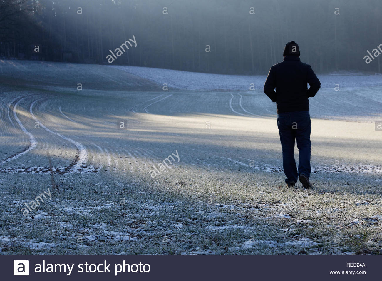 Person in winter jacket hi-res stock photography and images - Alamy