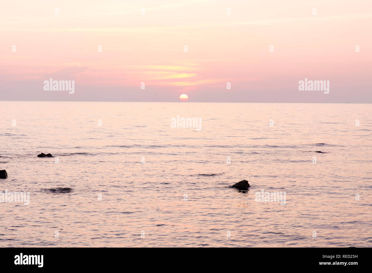 The sea sunset. Pink landscape Stock Photo - Alamy
