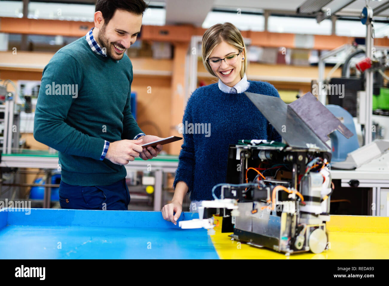 Young students of robotics working on project Stock Photo - Alamy
