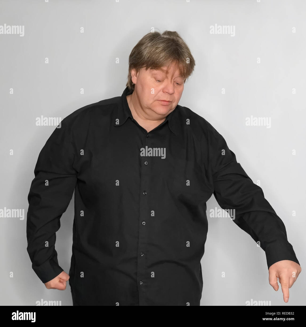 Father points at watch hi-res stock photography and images - Alamy