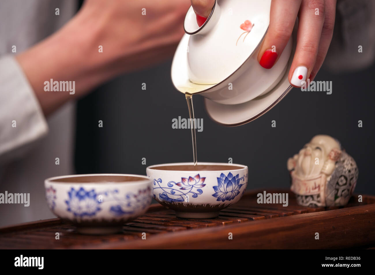 Woman with teacup hi-res stock photography and images - Alamy