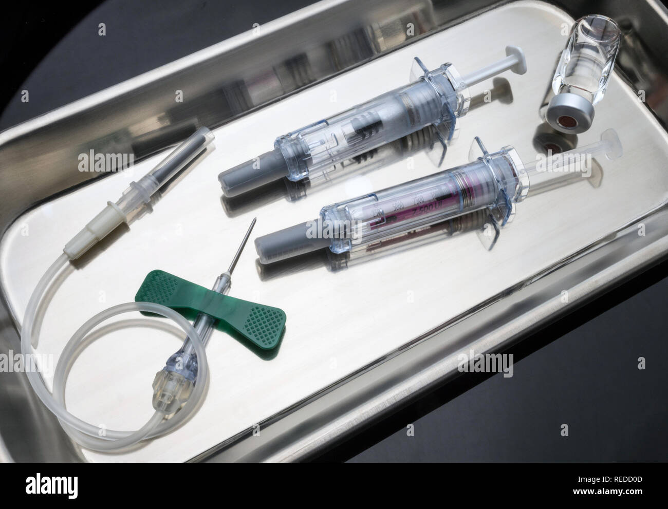 Subcutaneous Set and syringe in a laboratory, conceptual image Stock ...