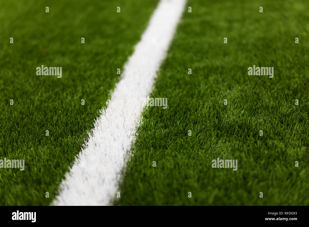 Close-up of artificial turf of soccer pitch. Soccer football field ...