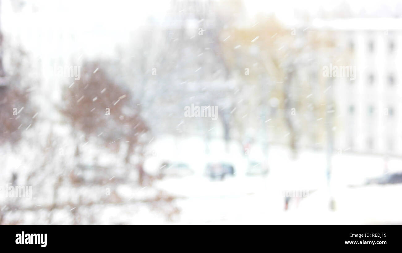 Blurry background of the winter. Slanting snow falling on blurred ...
