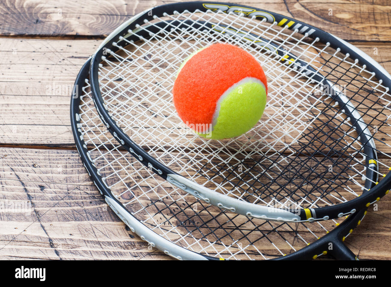 Tennis Ball and rackets on Wood Background, Sport Concept and Idea ...