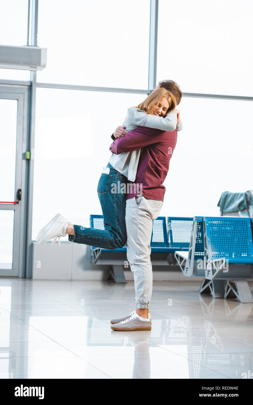 Beautiful couple hugging hall hi-res stock photography and images - Alamy