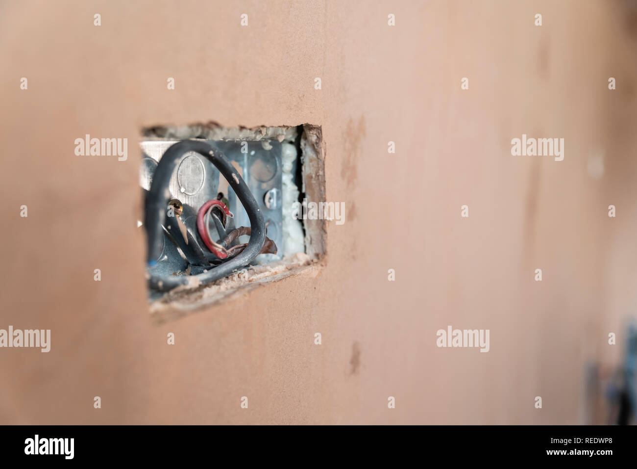 First fix domestic electrics in a freshly plastered wall Stock Photo ...