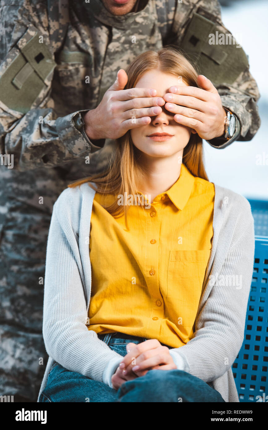 cropped view of veteran closing eyes of girlfriend Stock Photo - Alamy