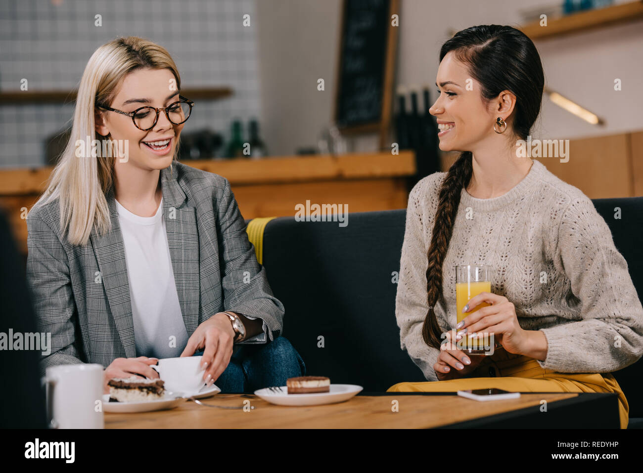 Chatting in cafe hi-res stock photography and images - Alamy