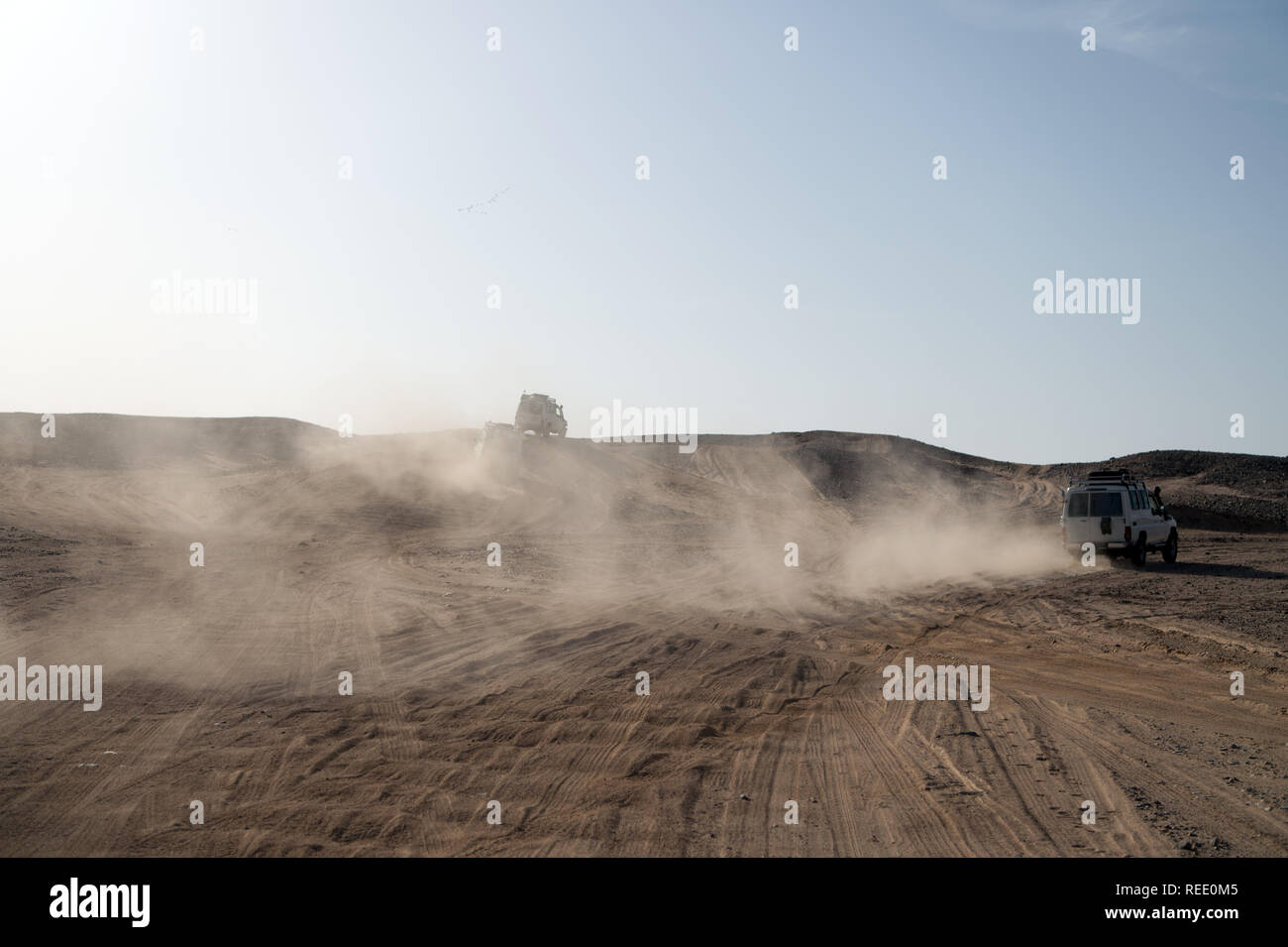 Competition racing challenge desert. Car overcome sand dunes obstacles ...