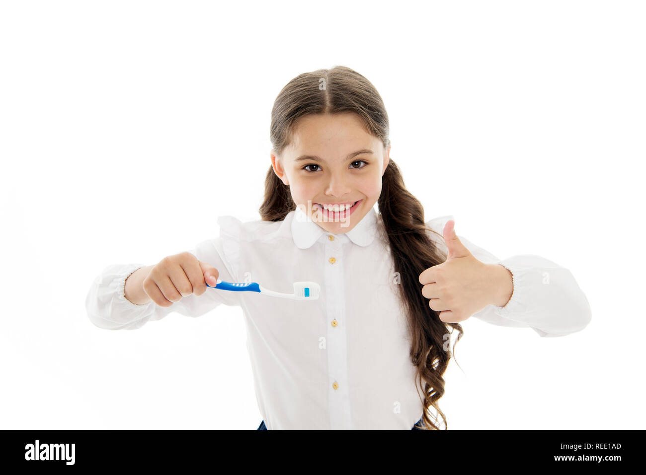 Girl brilliant perfect smile holds toothbrush with drop of paste white ...