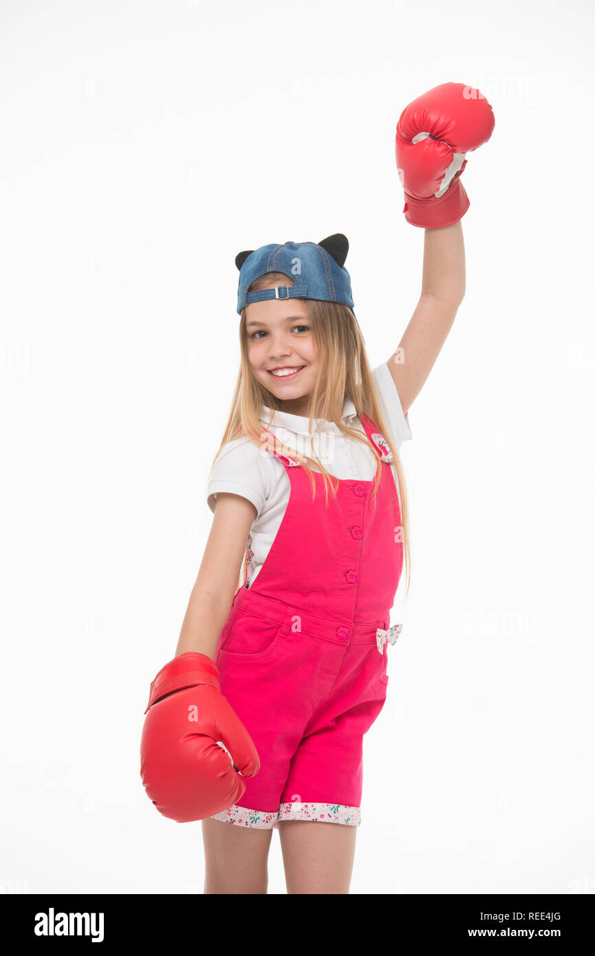 Girl on smiling face posing with boxing gloves, isolated on white ...