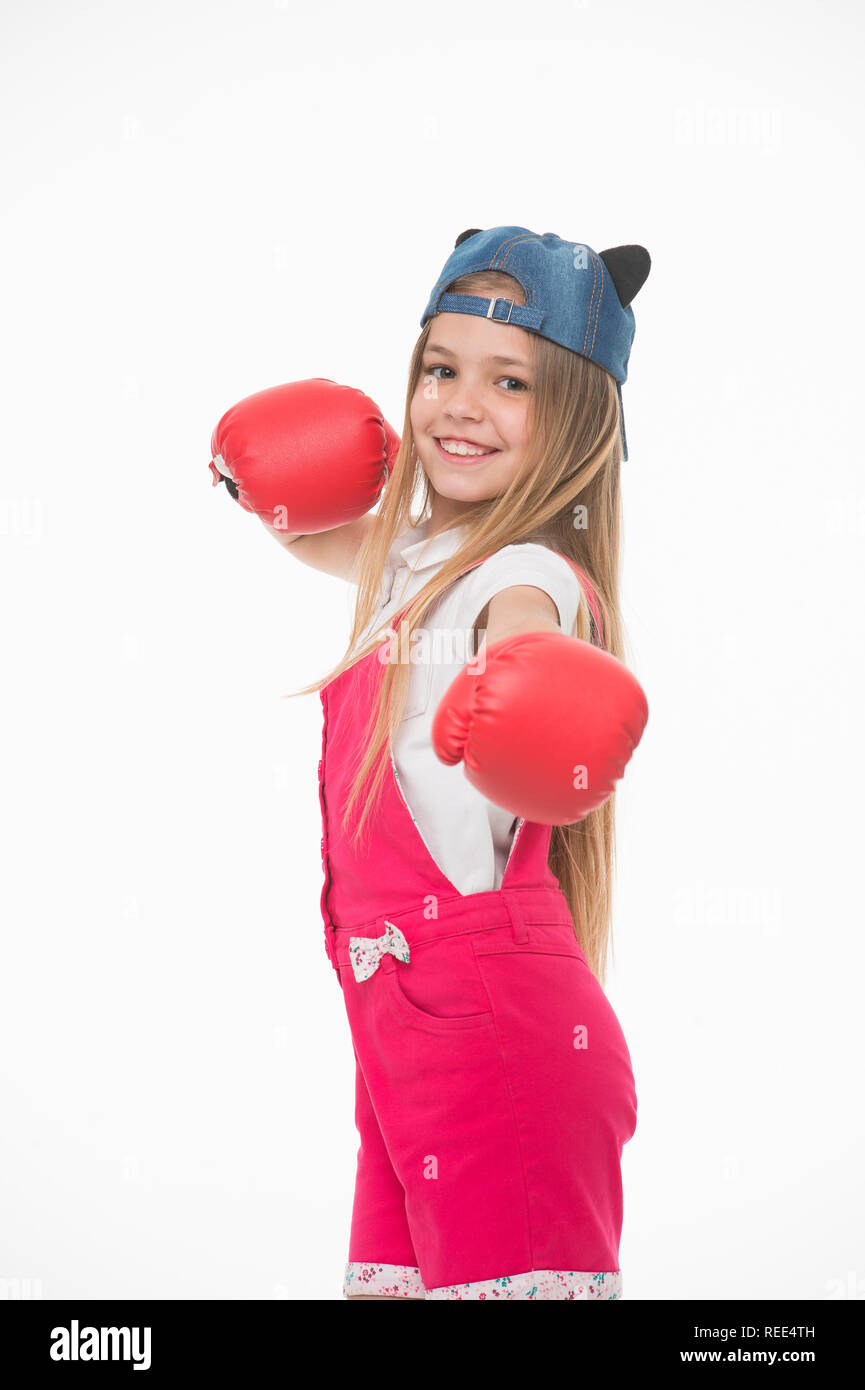 Happy girl in boxing gloves isolated on white. Little child smile ...